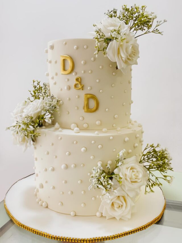 Cream Floral Fold Wedding Cake - Diva Cakes